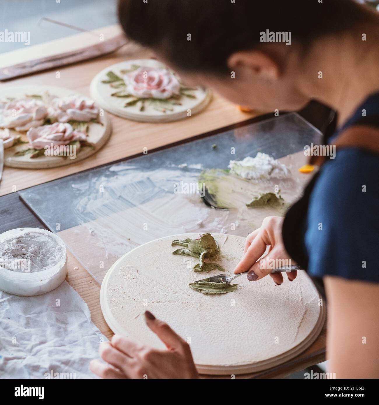 artist workplace inspiration ceramic artwork woman Stock Photo - Alamy