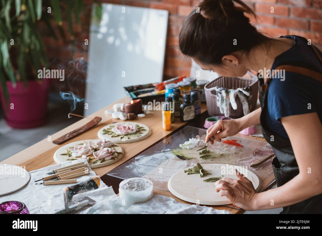 clay art ceramic craft artist studio workplace Stock Photo - Alamy