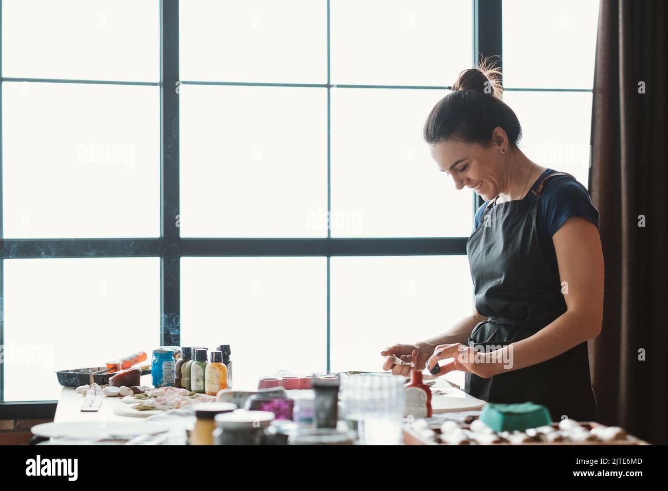 artist studio workspace woman artwork creating Stock Photo - Alamy