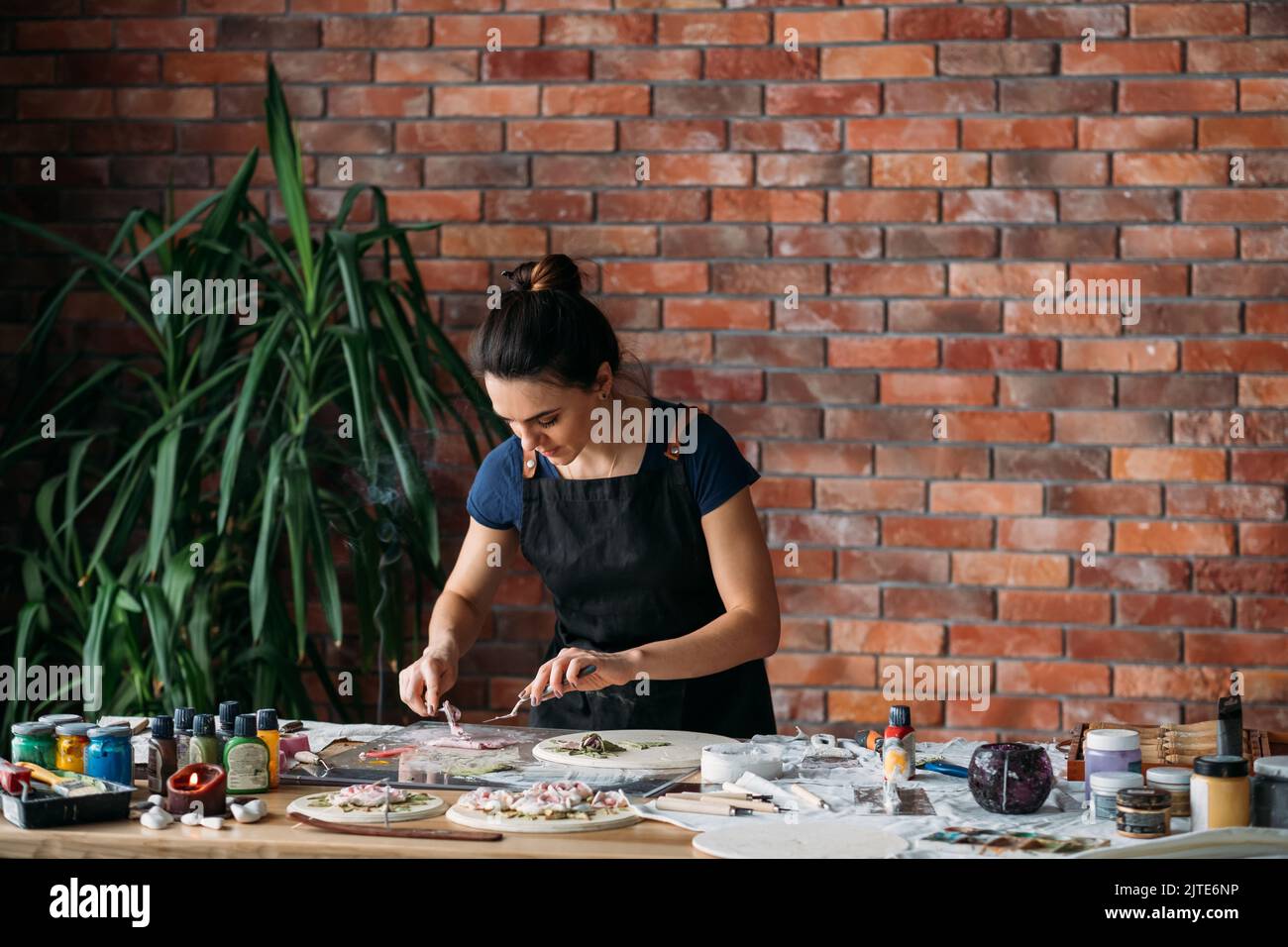 ceramic craft artwork inspiration woman tools Stock Photo - Alamy