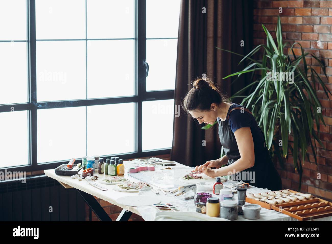 ceramic handicraft artwork inspiration woman tools Stock Photo - Alamy