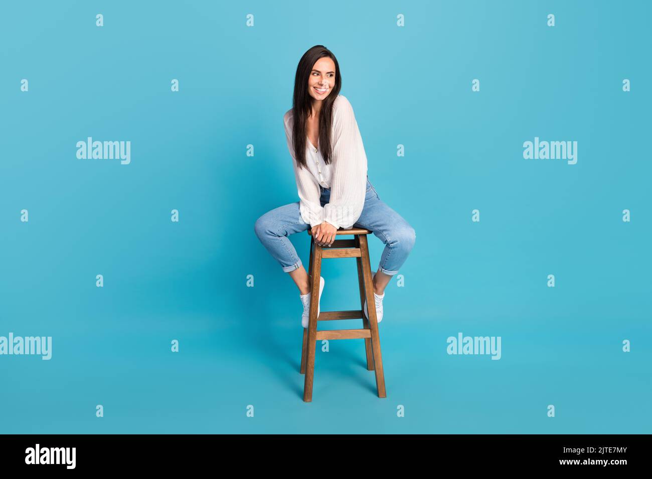 Full body photo of gorgeous lovely lady sitting stool look empty space ...