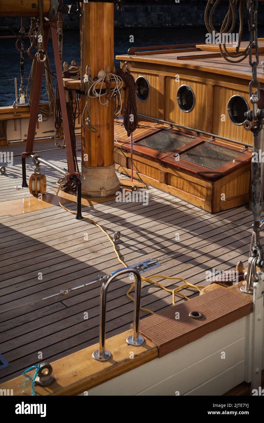 A vertical shot of the inside of a boat made with wooden materials ...