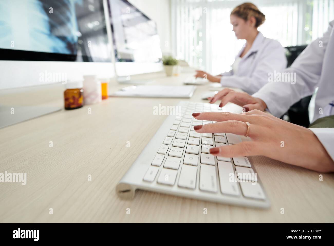 Researcher woman doctor typing hi-res stock photography and images - Alamy