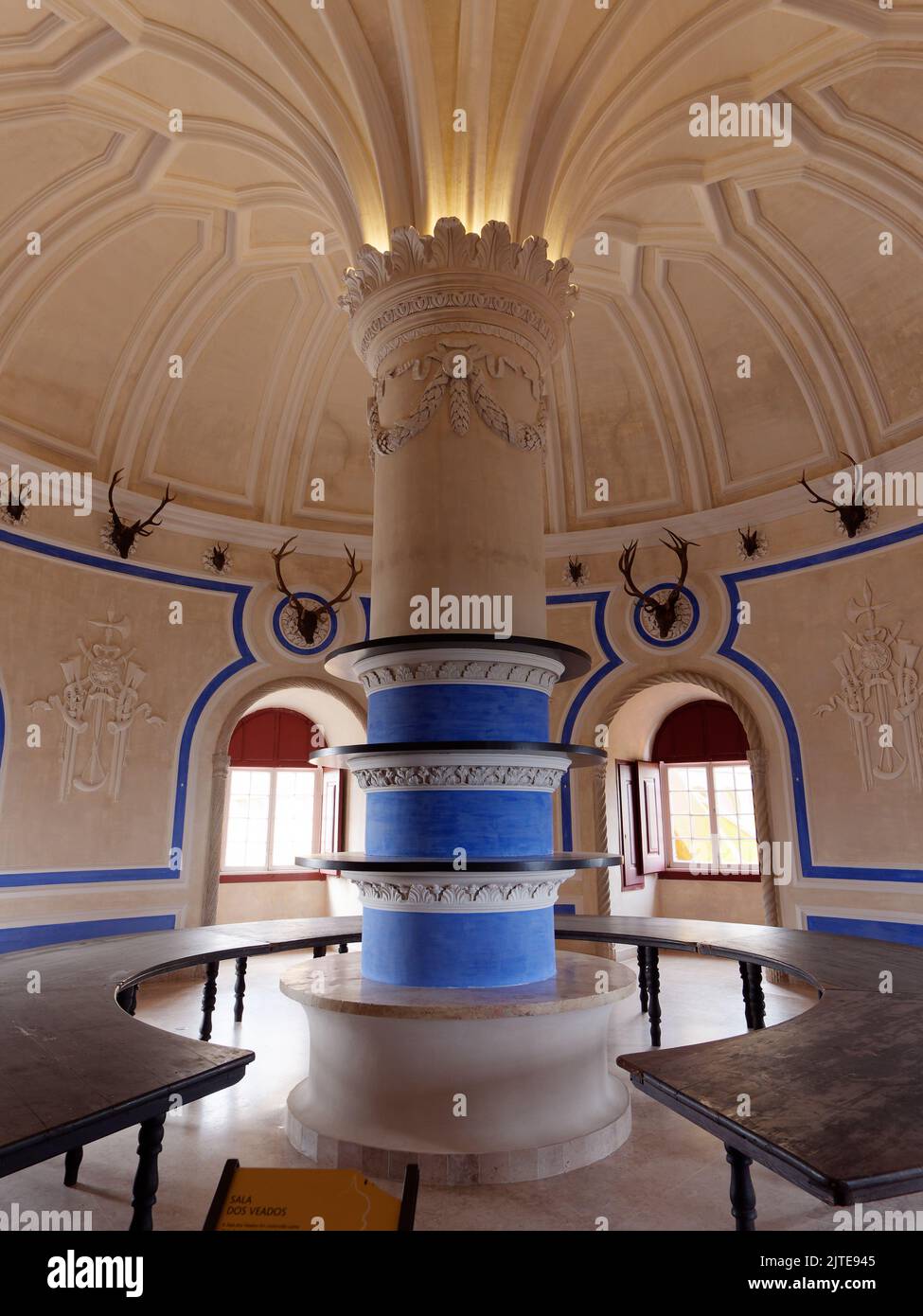 Round shaped room with round benches and a central column inside the ...