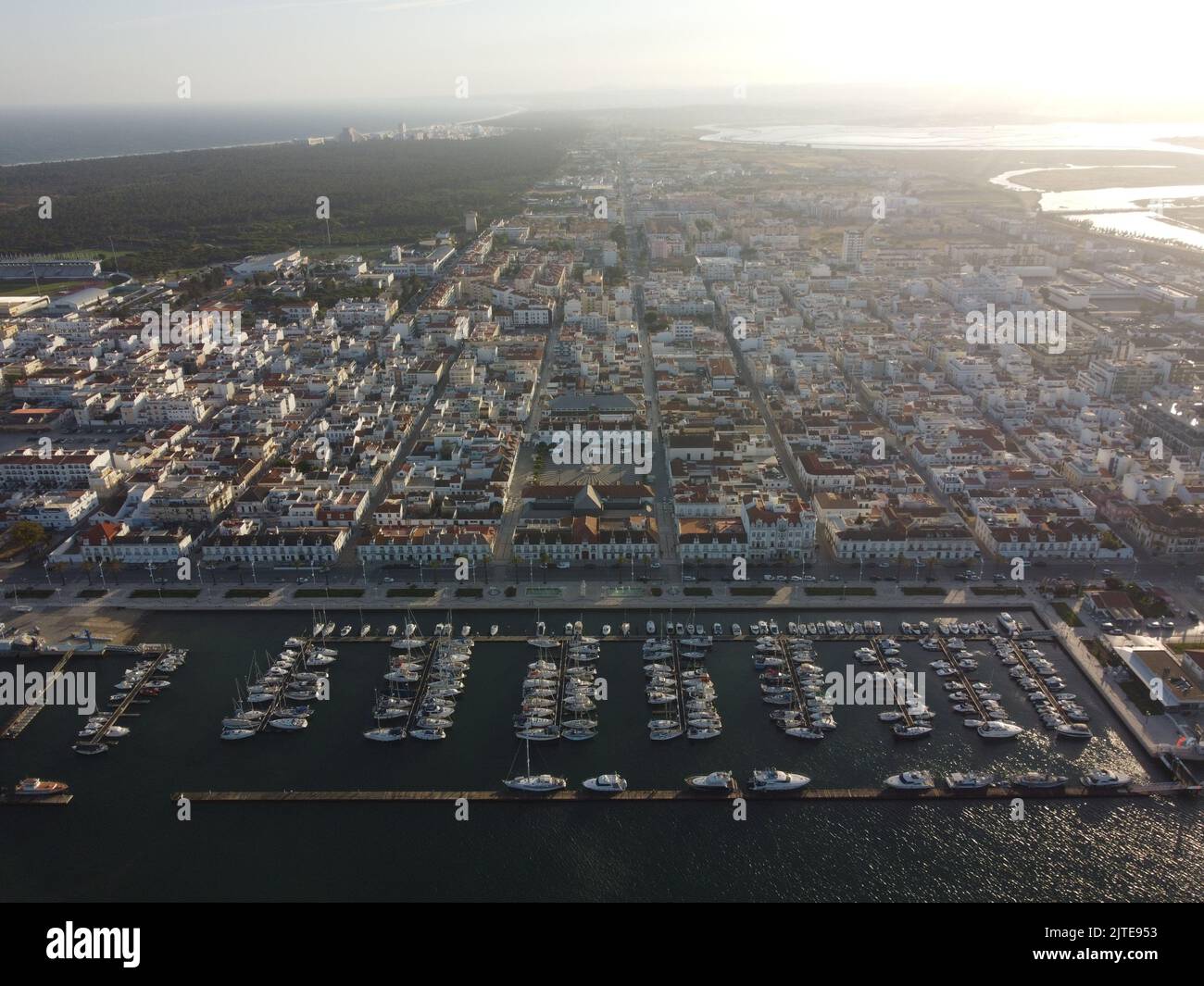 An aerial view of the harbour and a coastal town Stock Photo - Alamy