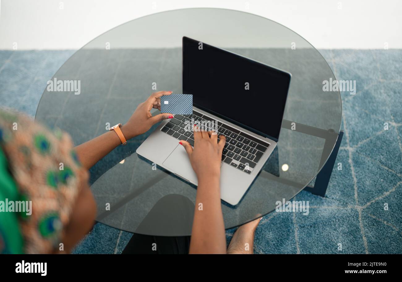 High angle view shot above of Black African woman making an online ...
