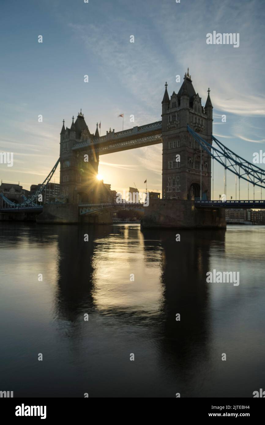 Sun rises behind Tower Bridge London on a beautiful summer morning ...
