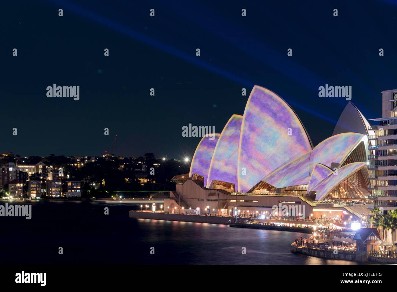 The Sydney Opera House and part of Circular Quay lit up with ...