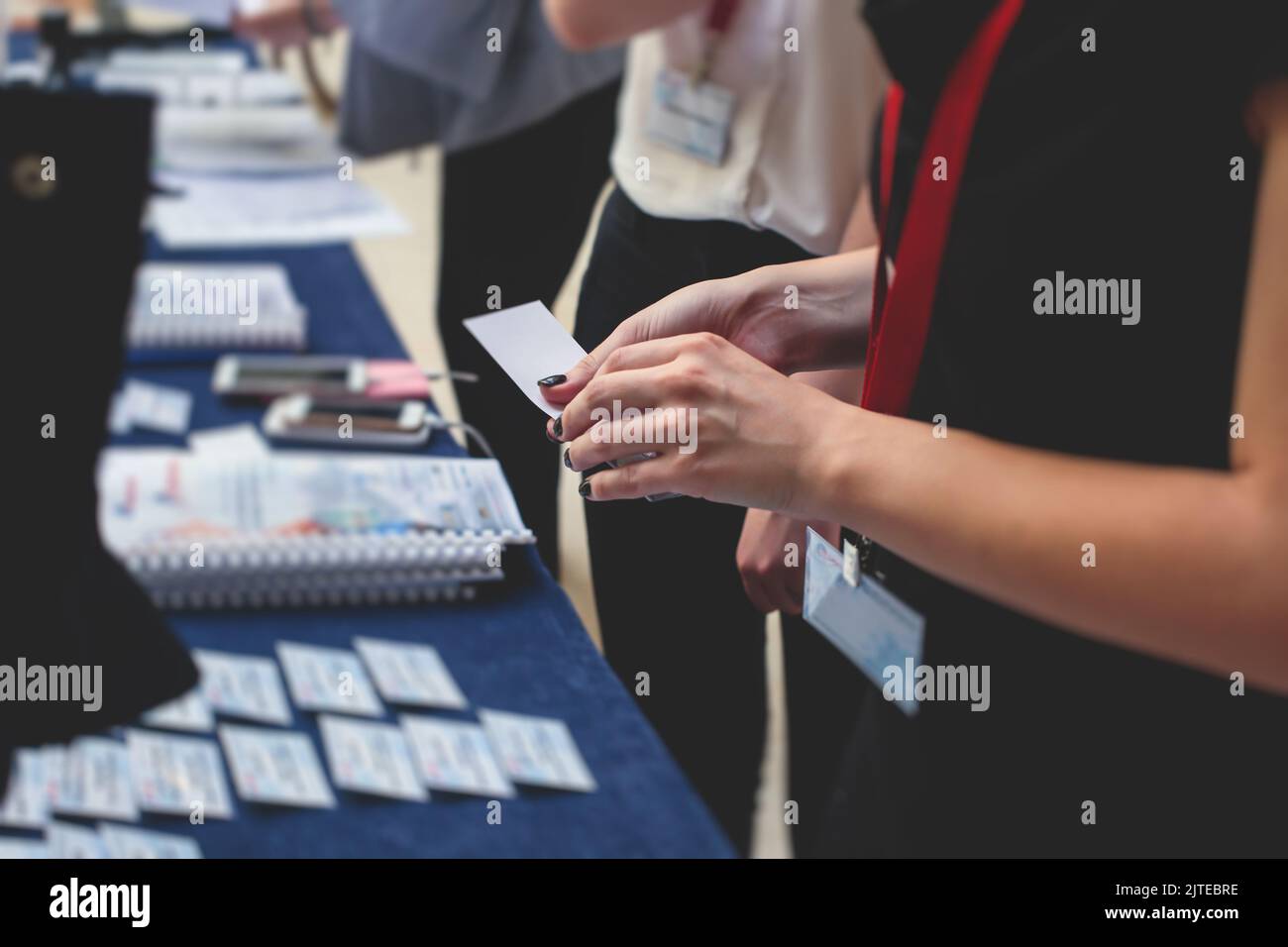 Process of checking in on a conference congress forum event ...