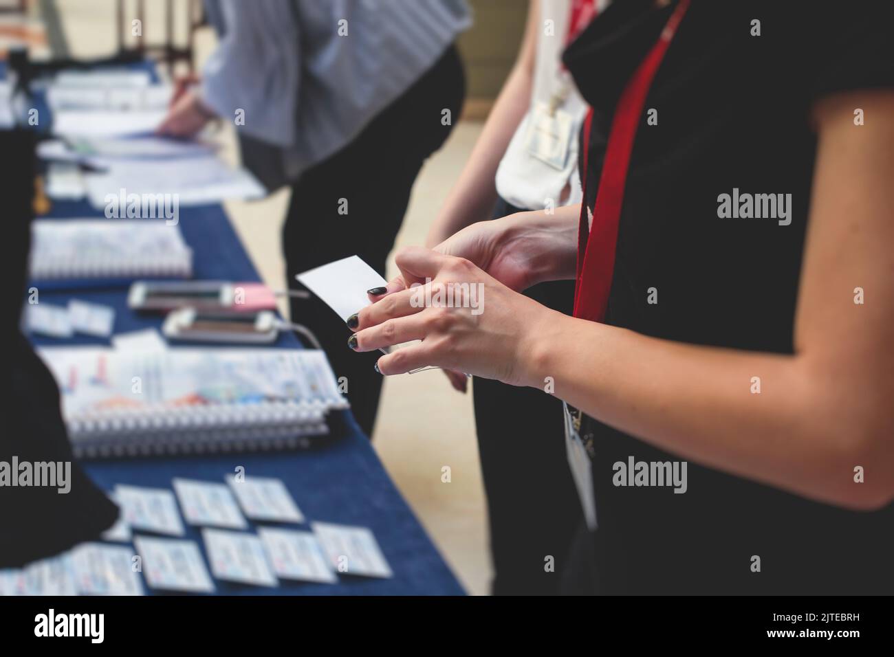 Process of checking in on a conference congress forum event ...