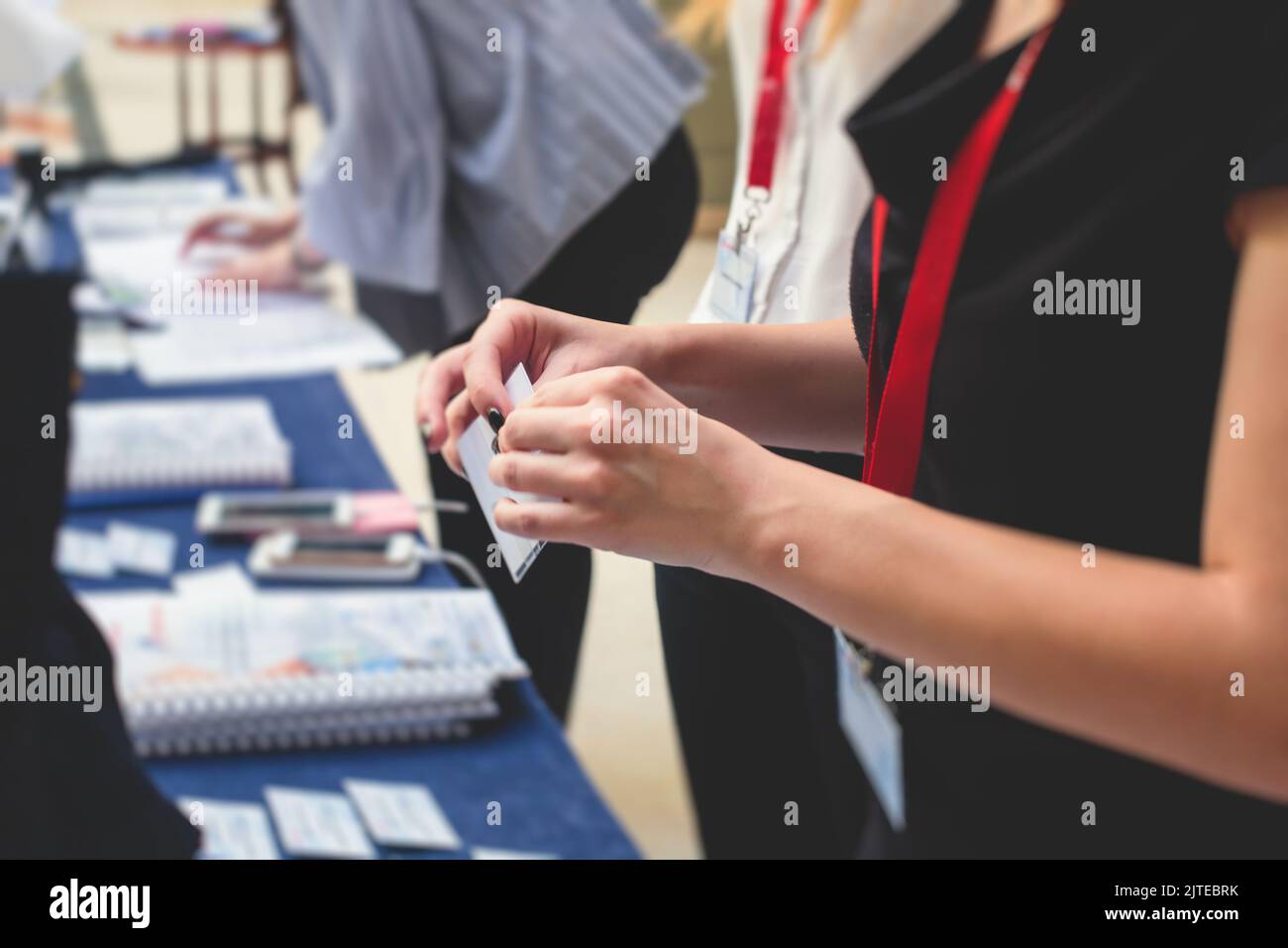 Process of checking in on a conference congress forum event ...