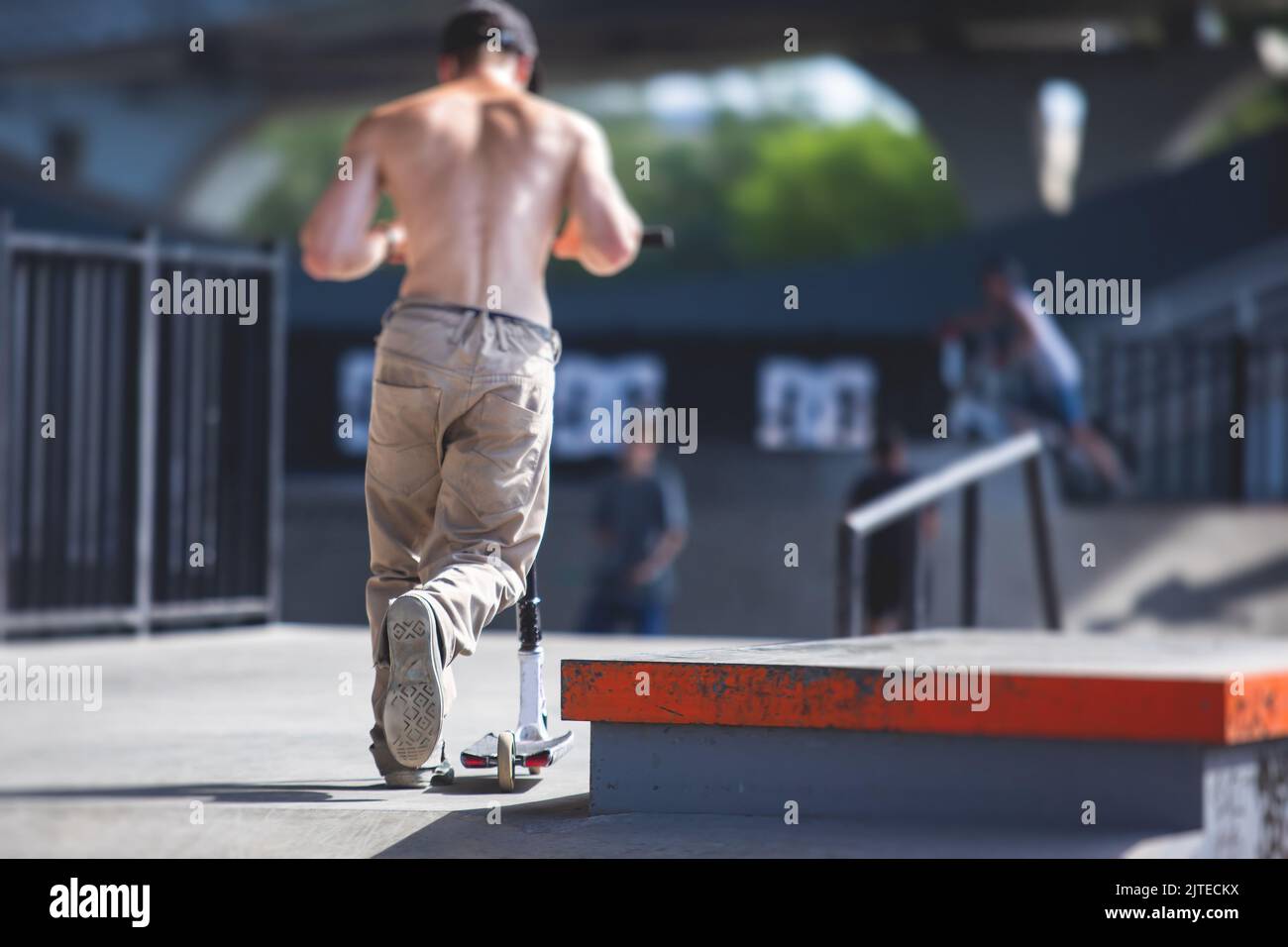 Stunts on a scooter hi-res stock photography and images - Alamy