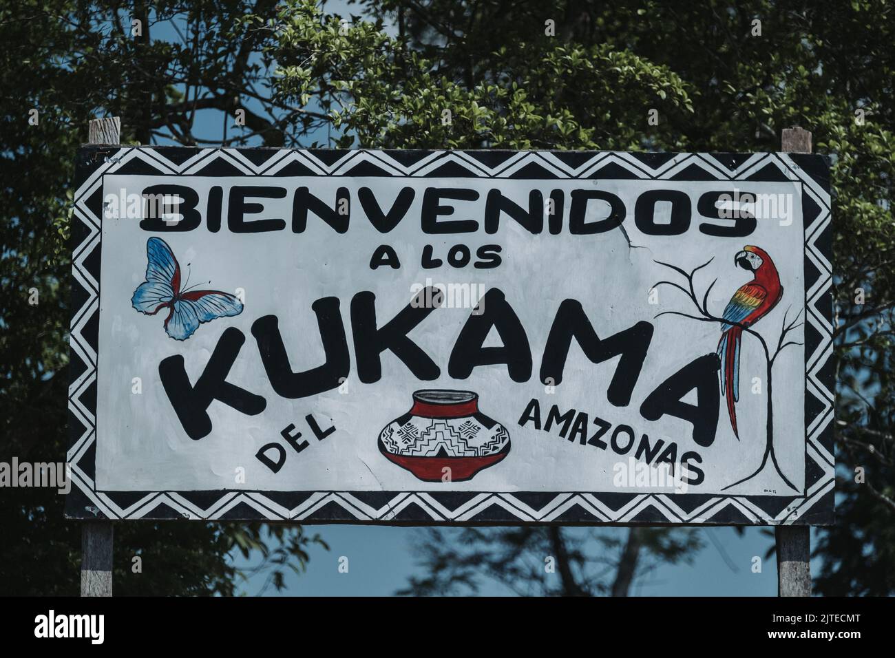 A closeup shot of a welcome to Kukama sign in the Peruvian Amazonia ...