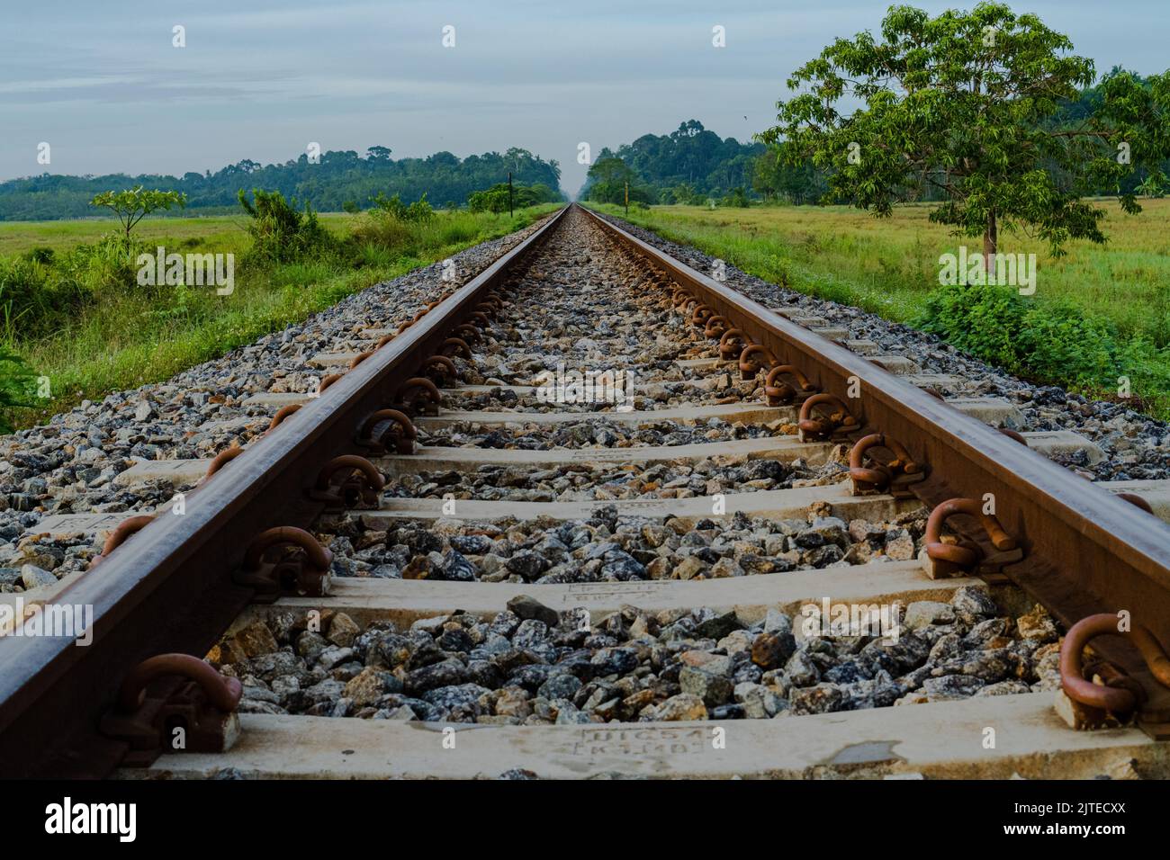 A railway track that runs through an isolated part of the east coast of ...