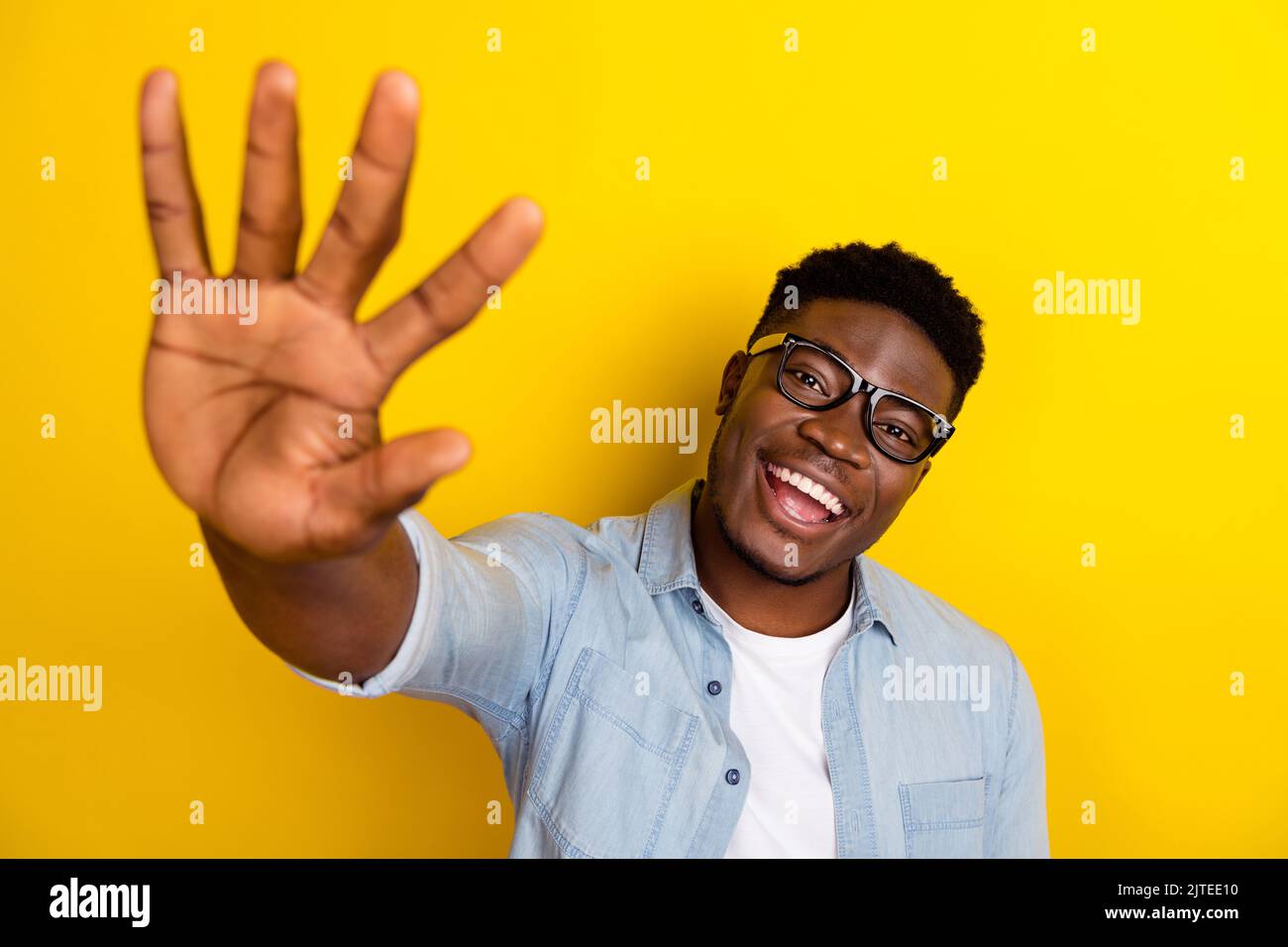 Photo of cheerful guy manager done project partner give high five ...