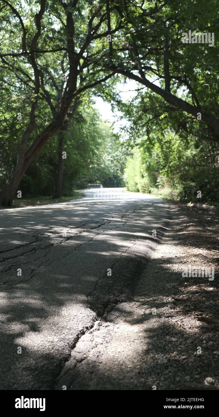 Road with cracks hi-res stock photography and images - Alamy