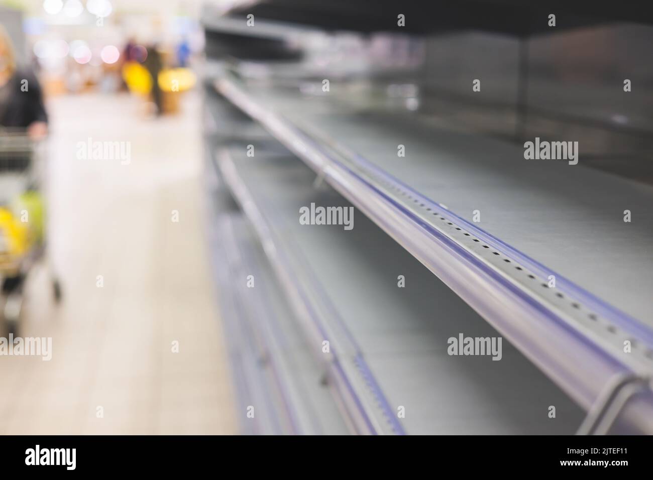 View of empty supermarket shelves, grocery store work stoppage closes ...