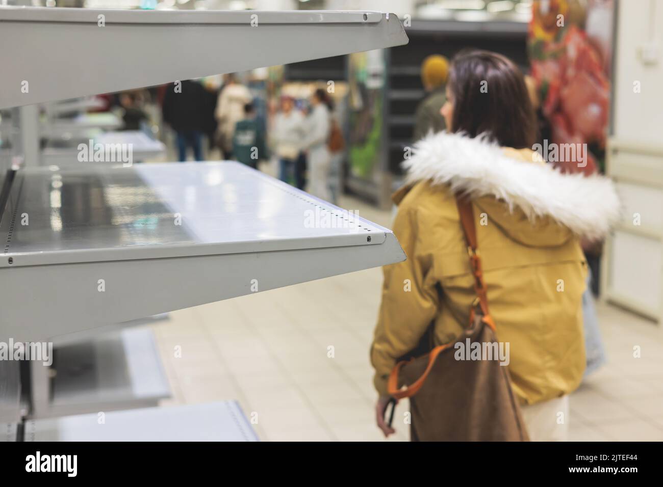 View of empty supermarket shelves, grocery store work stoppage closes ...