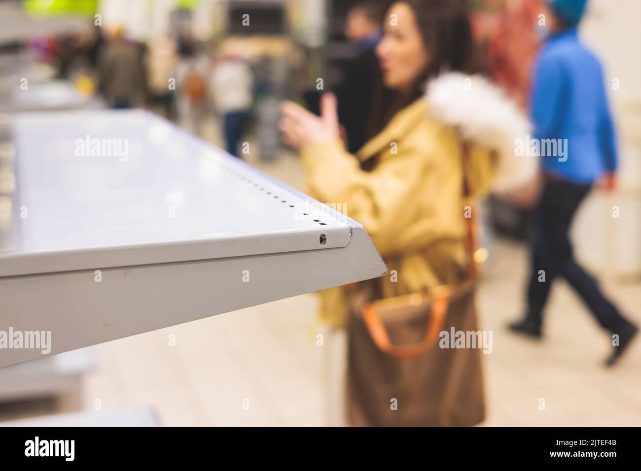 View of empty supermarket shelves, grocery store work stoppage closes ...