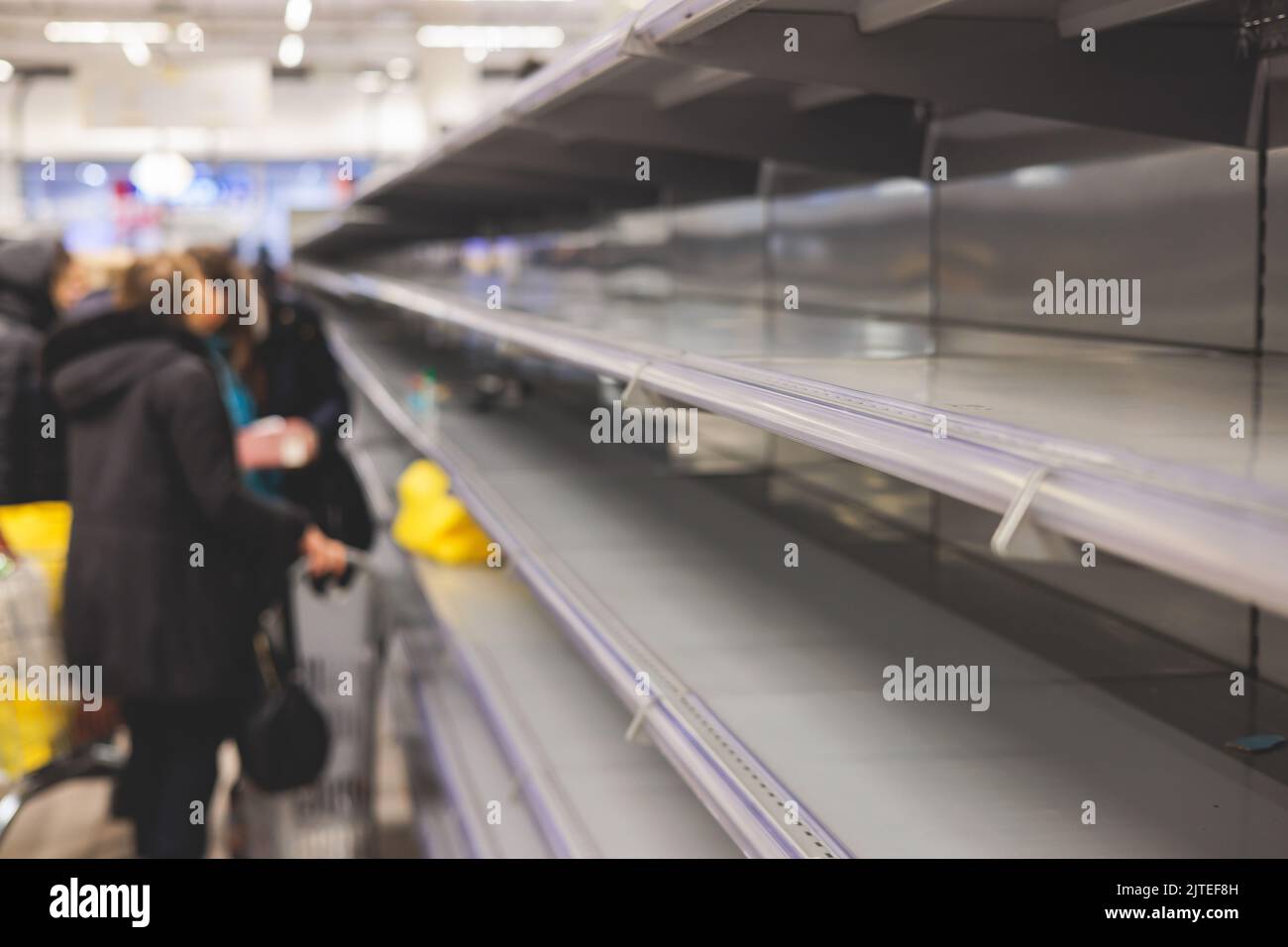 View of empty supermarket shelves, grocery store work stoppage closes ...