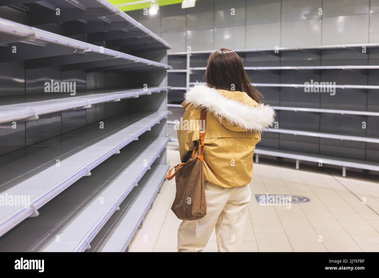 View of empty supermarket shelves, grocery store work stoppage closes ...