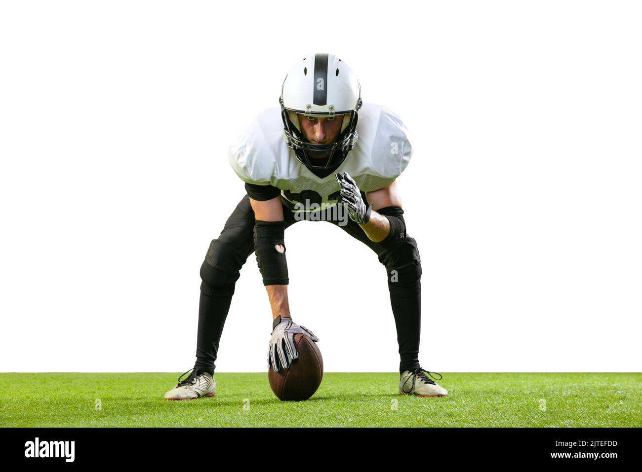 Portrait of concentrated man, american football player starting game ...
