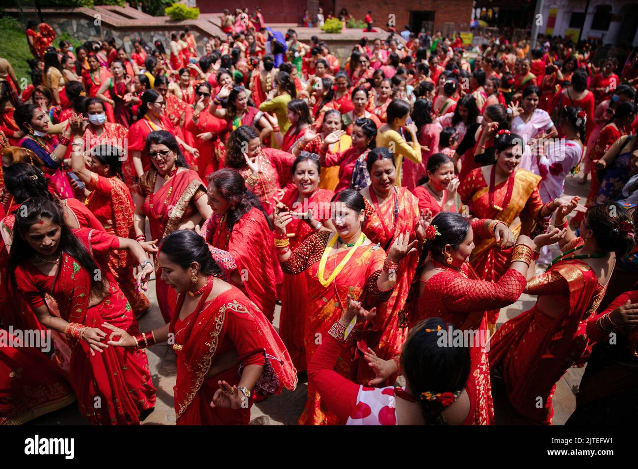 Nepalese Hindu women sing, dance, and celebrate while dressed in ...