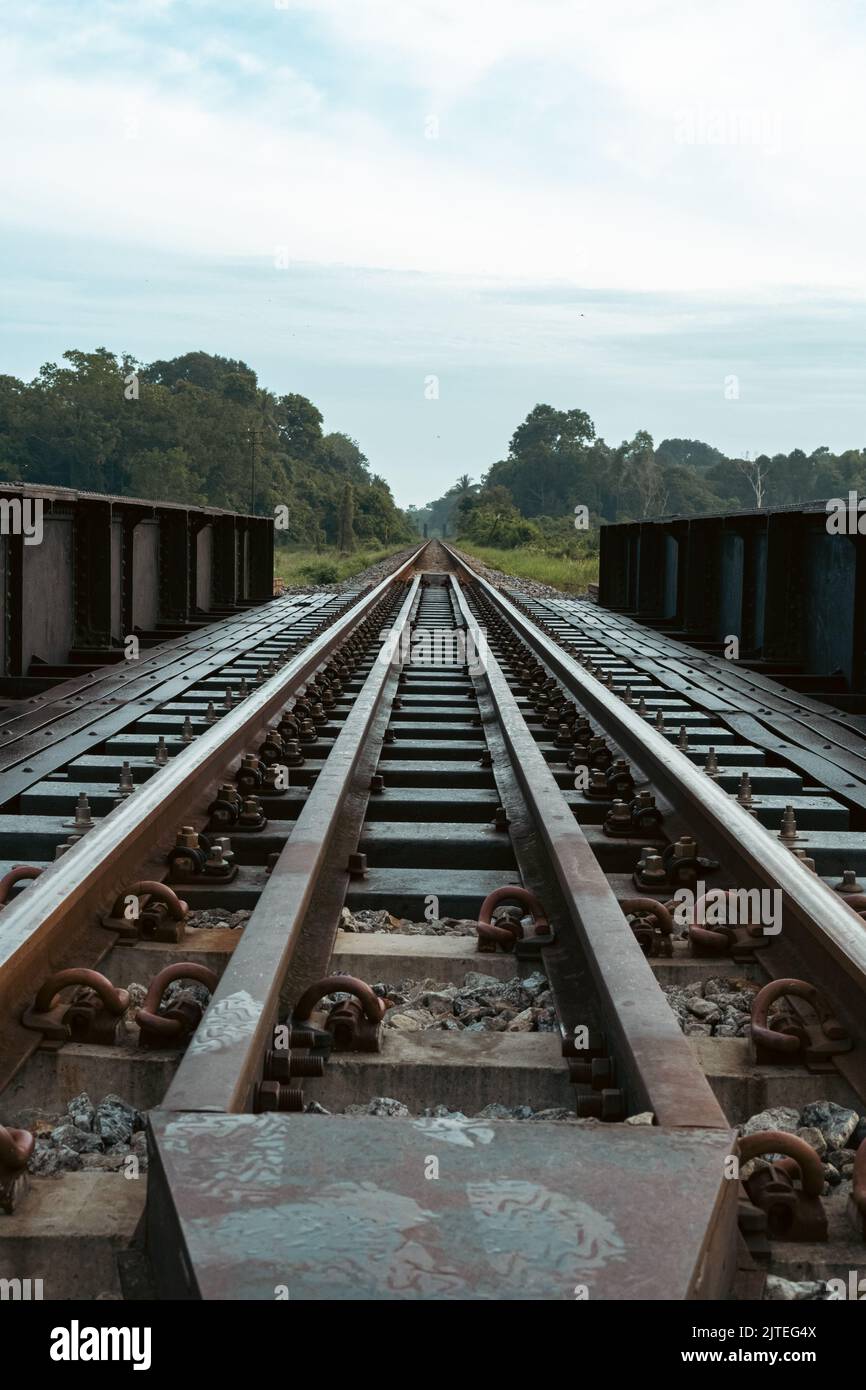 A railway track that runs through an isolated part of the east coast of ...