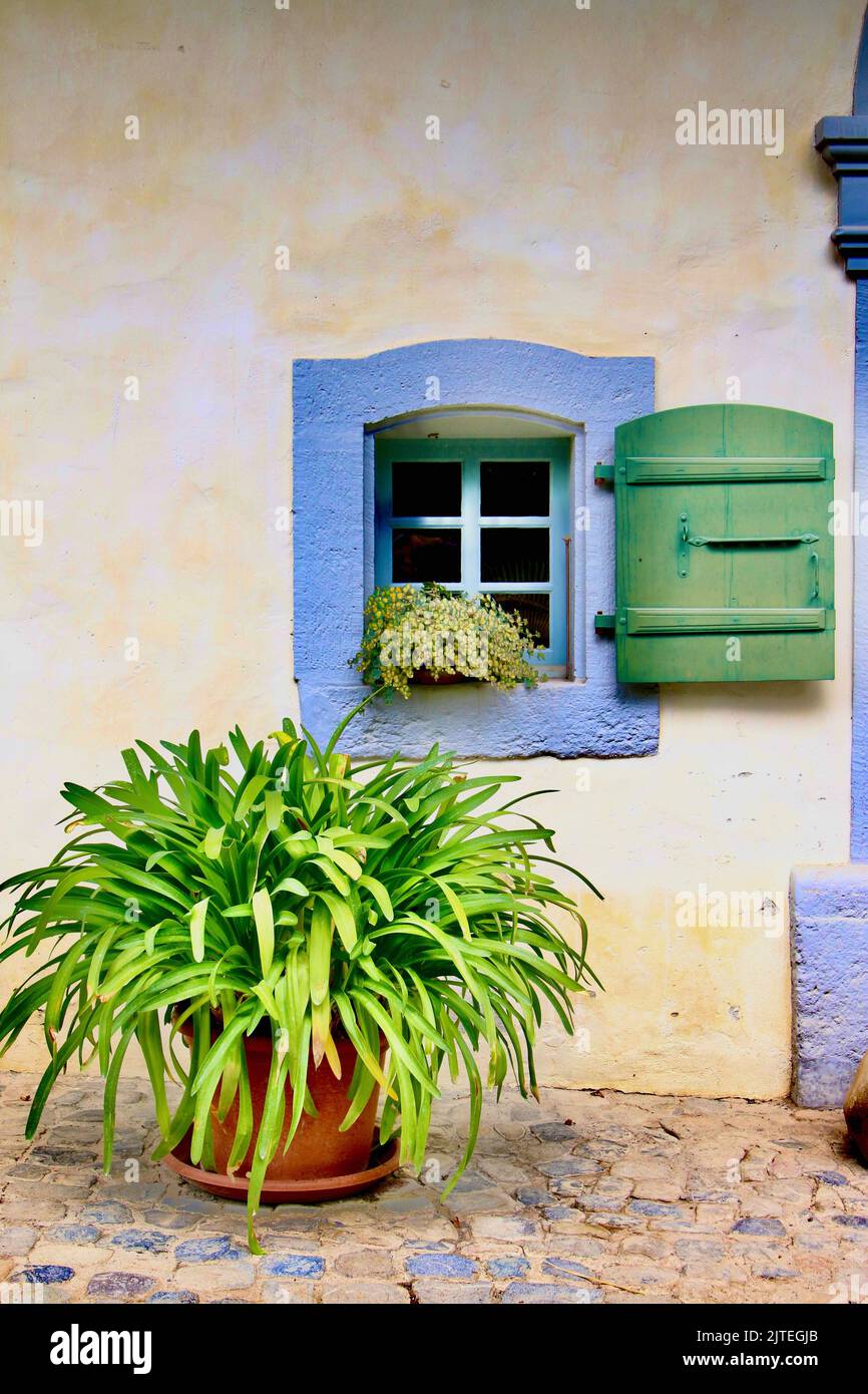 french style windows with green shutters Stock Photo - Alamy