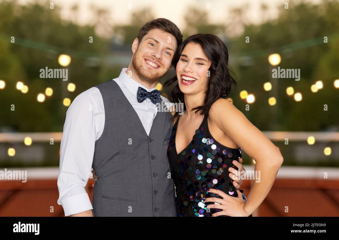 happy couple hugging at rooftop party Stock Photo - Alamy