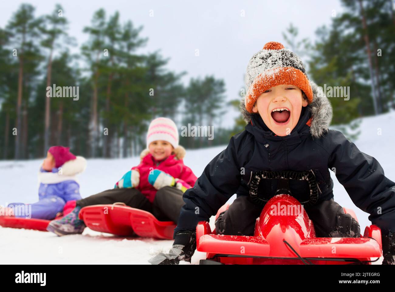 Children sliding hi-res stock photography and images - Alamy