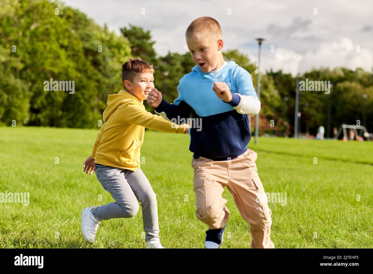 Happy boys playing hi-res stock photography and images - Alamy