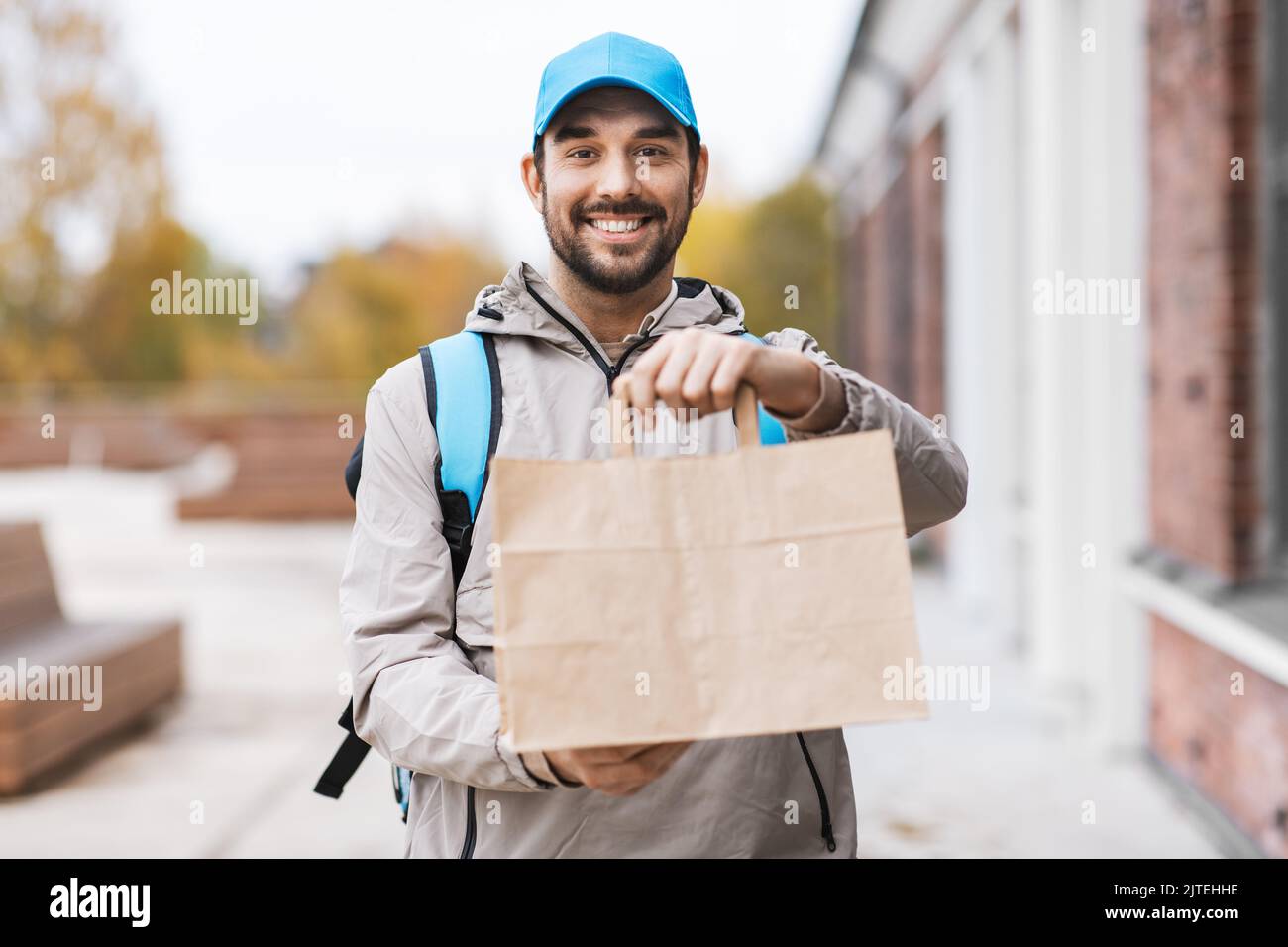 Man carrying takeaway cup hi-res stock photography and images - Alamy