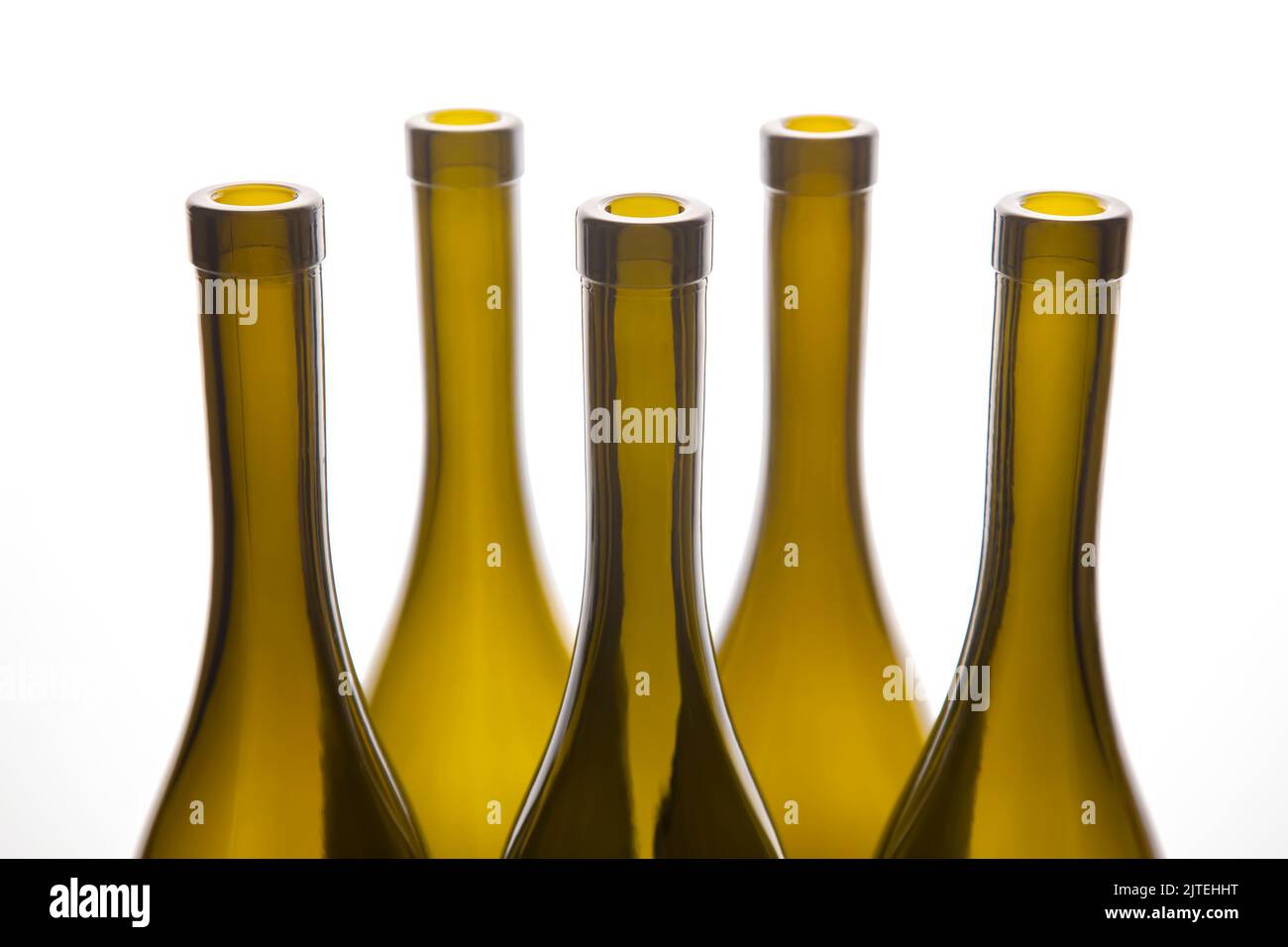 empty bottles of wine on white background Stock Photo - Alamy