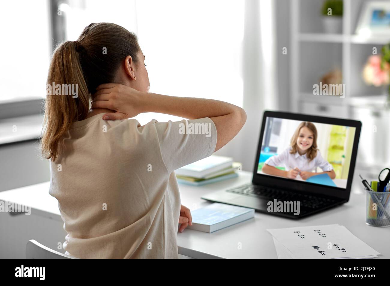 Child touching neck hi-res stock photography and images - Alamy
