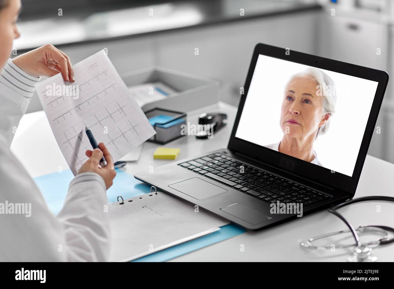 doctor with laptop having video call at hospital Stock Photo - Alamy