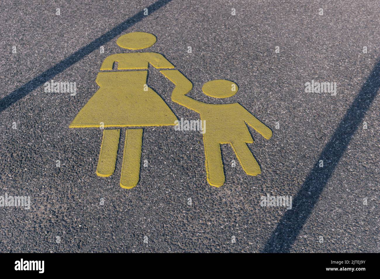 Road marking mother and child Stock Photo - Alamy