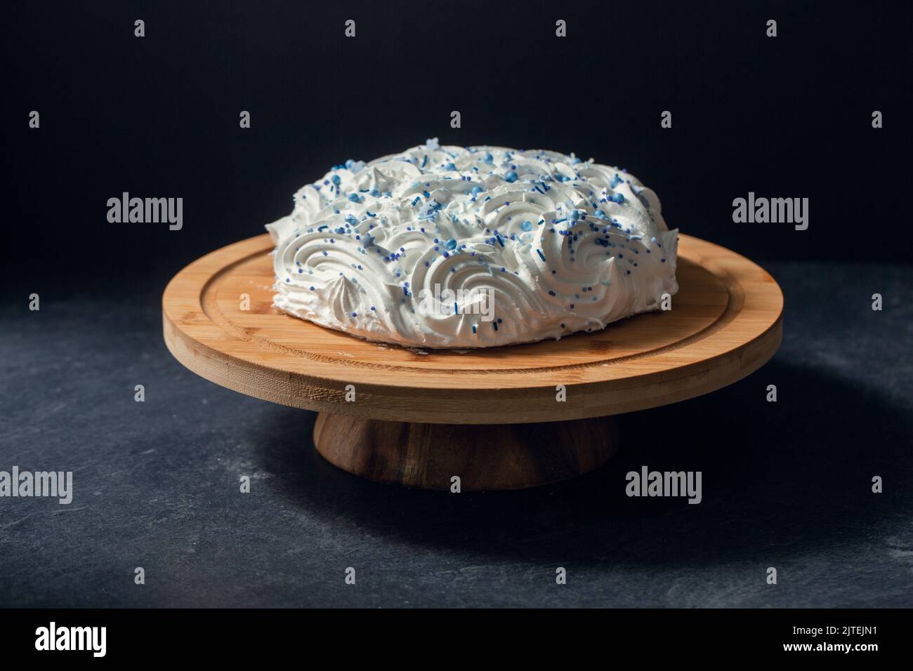 close up of zephyr cake on wooden stand Stock Photo - Alamy
