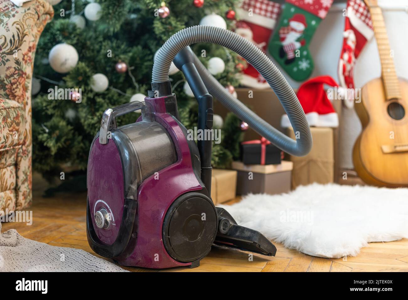 christmas tree vacuum cleaner, cleaning up Stock Photo - Alamy