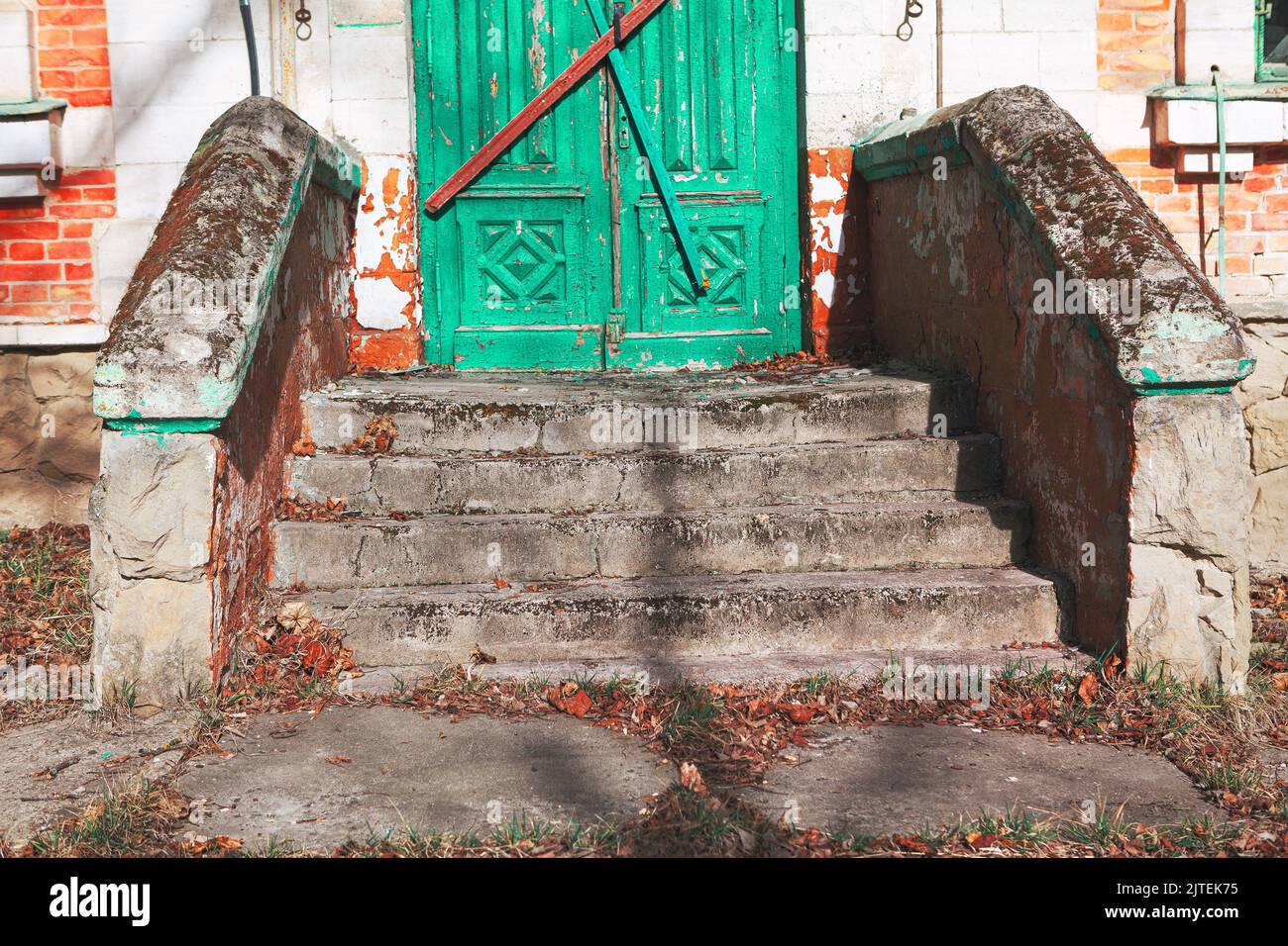 Staircase and door of abandoned house . Entrance and stairs of obsolete ...