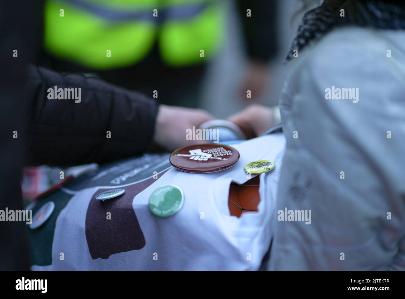 Chest badges for sale from a street vendor in a pillow Stock Photo - Alamy