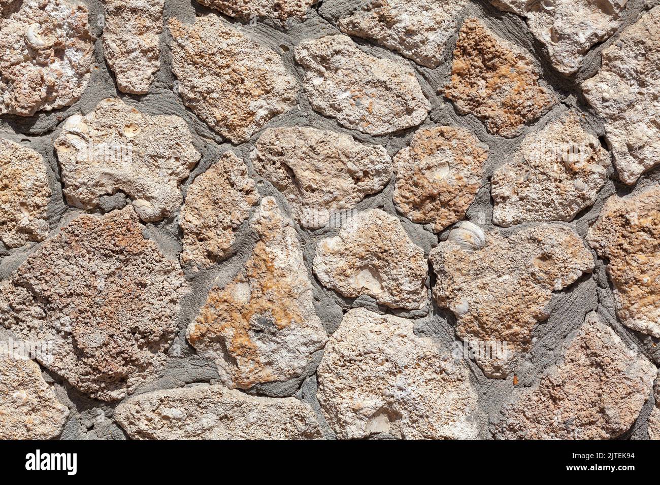 Stones and cement . Stoney background and texture . Stone wall ...