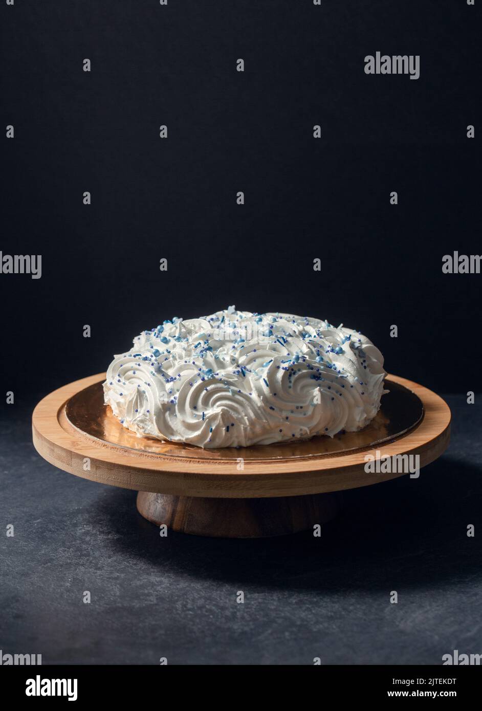 close up of zephyr cake on wooden stand Stock Photo - Alamy