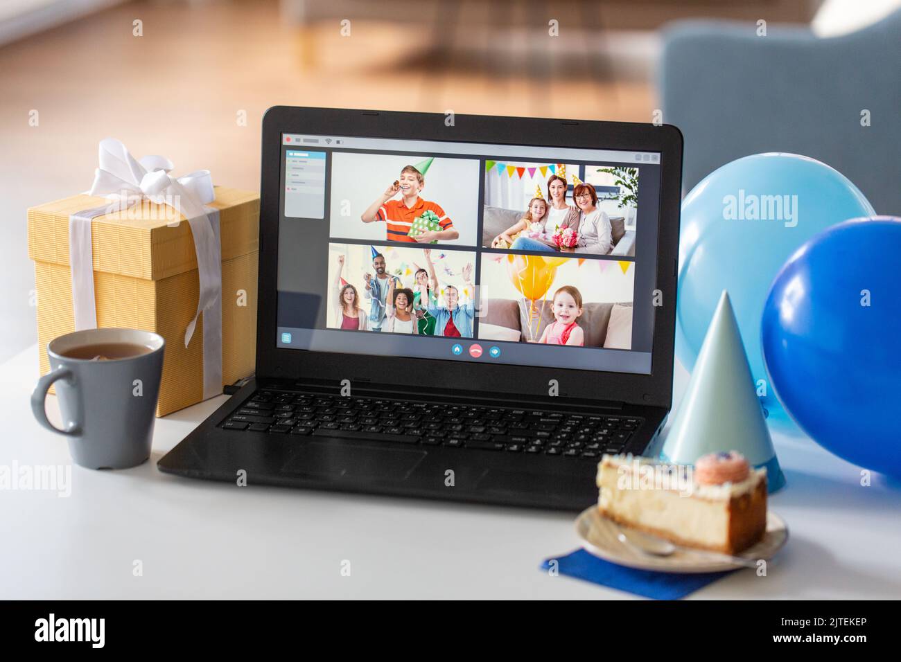 laptop with video call or online birthday party Stock Photo - Alamy