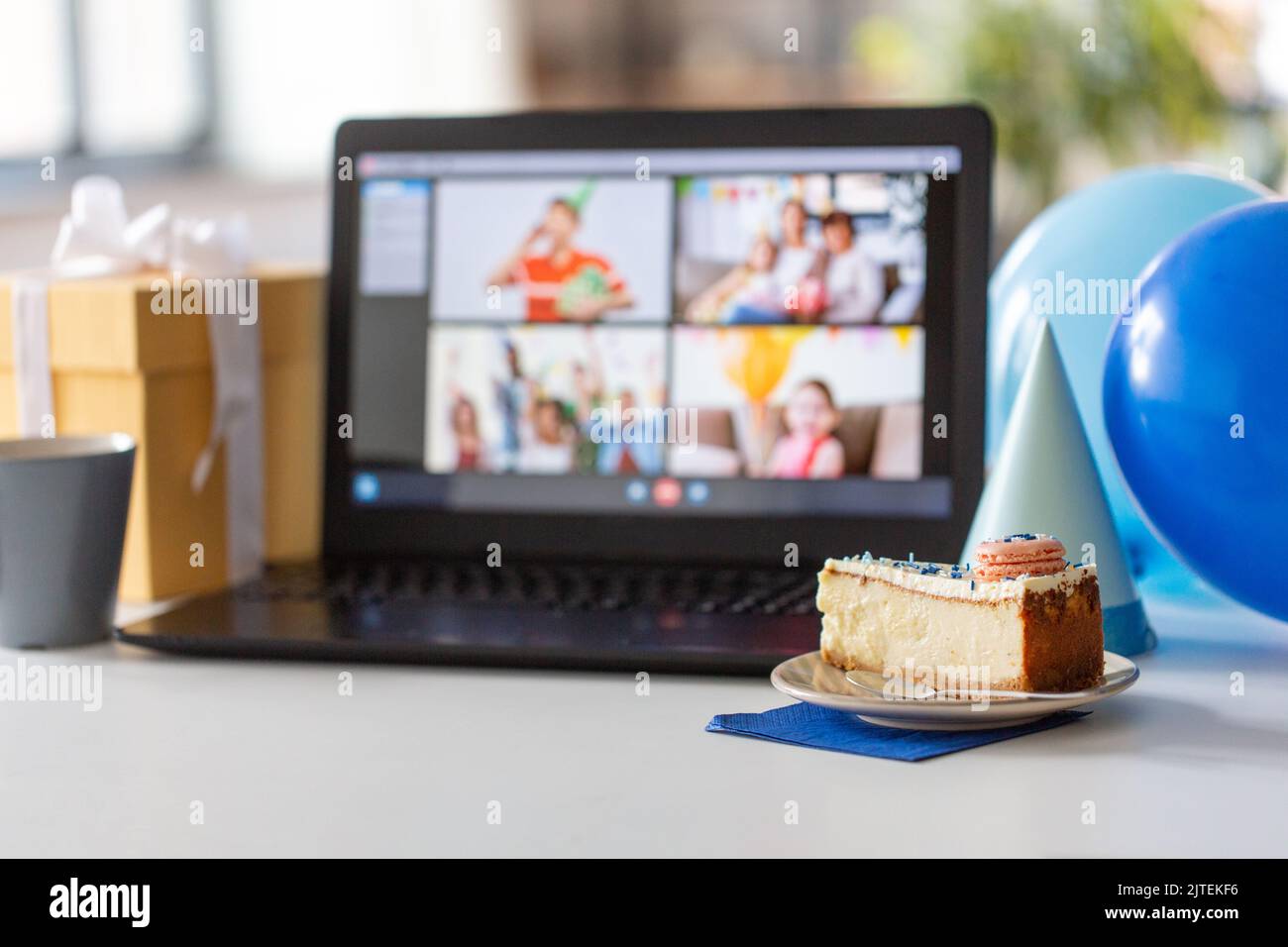 birthday cake and laptop with video call on screen Stock Photo - Alamy