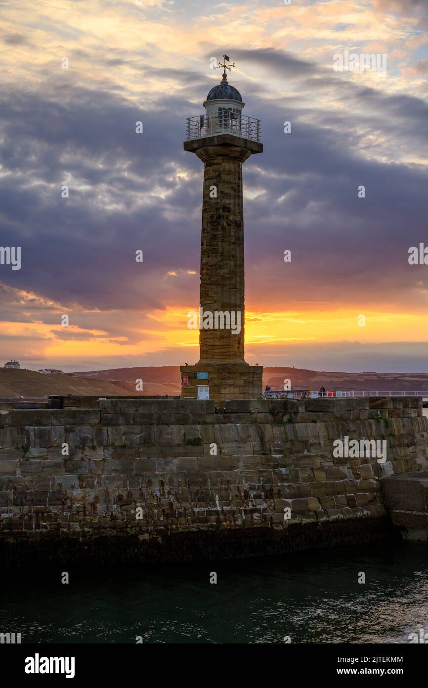 West Lighthouse is a 19th Century lighthouse on a pier in Whitby Stock ...