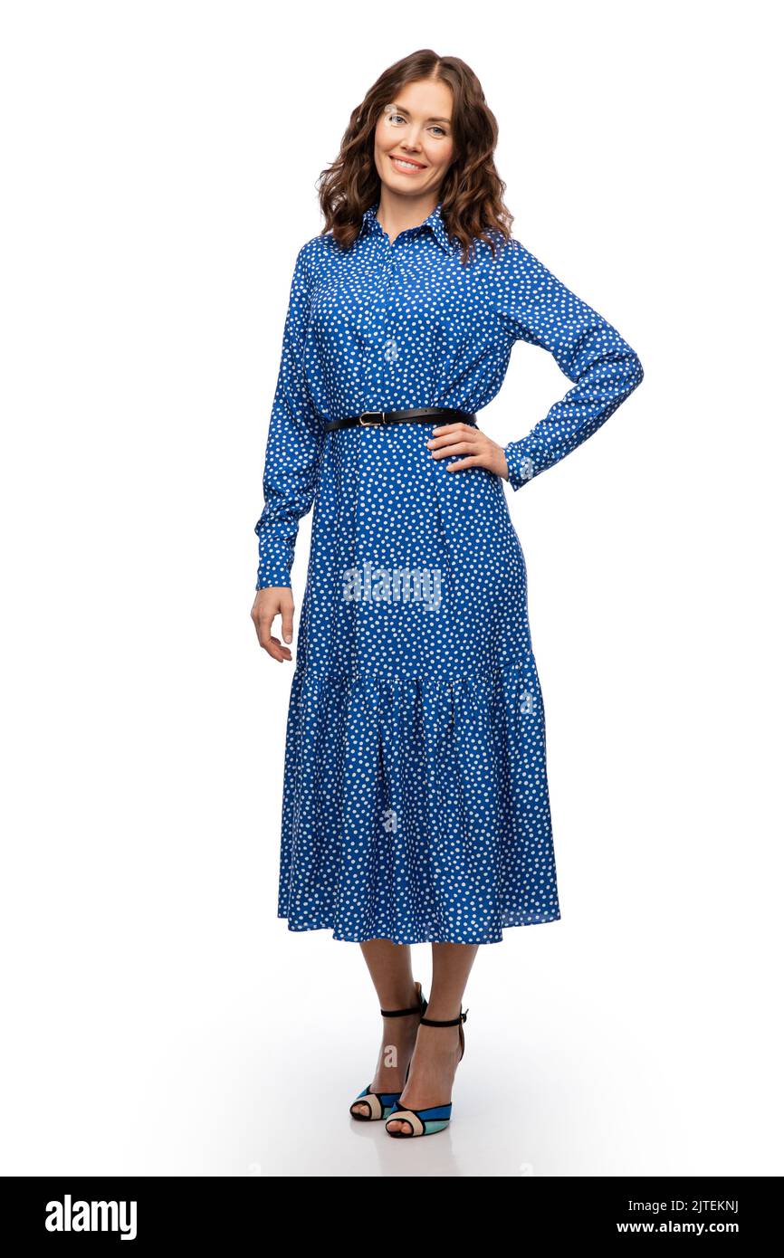 happy smiling beautiful young woman in blue dress Stock Photo - Alamy