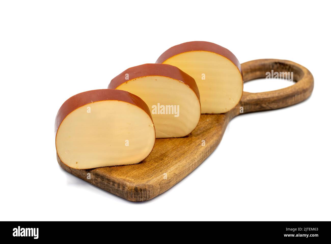 Smoked cheese. Dutch smoked cheese isolated on a white background ...