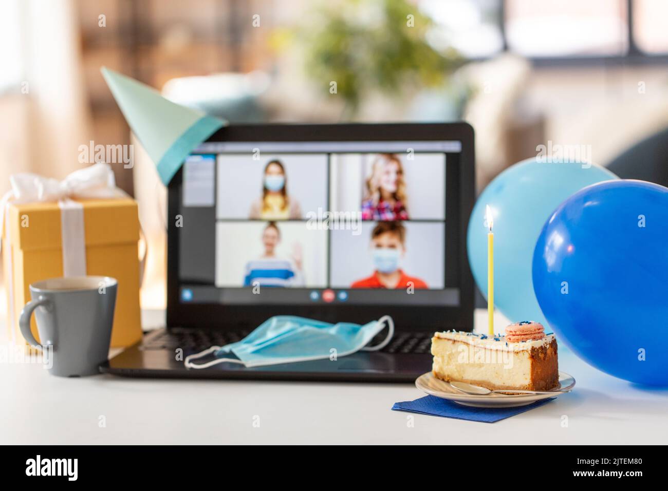 birthday cake and laptop with video call on screen Stock Photo - Alamy